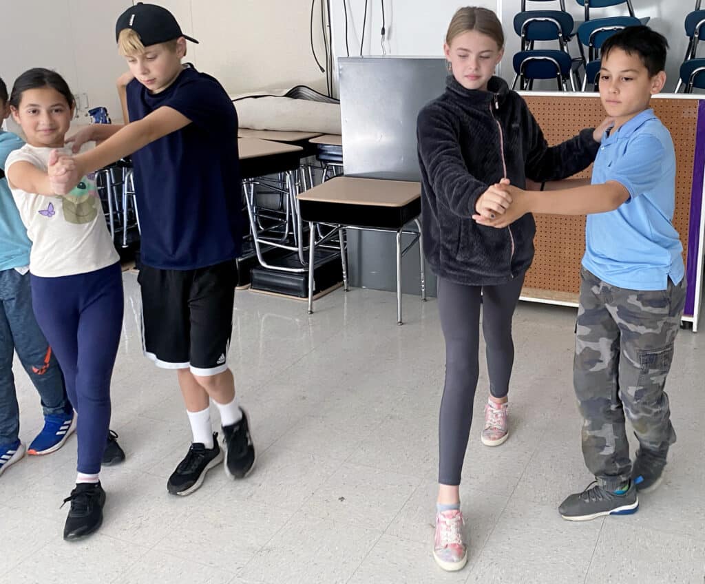 Elementary students get ready to rhumba with ballroom dance lessons ...